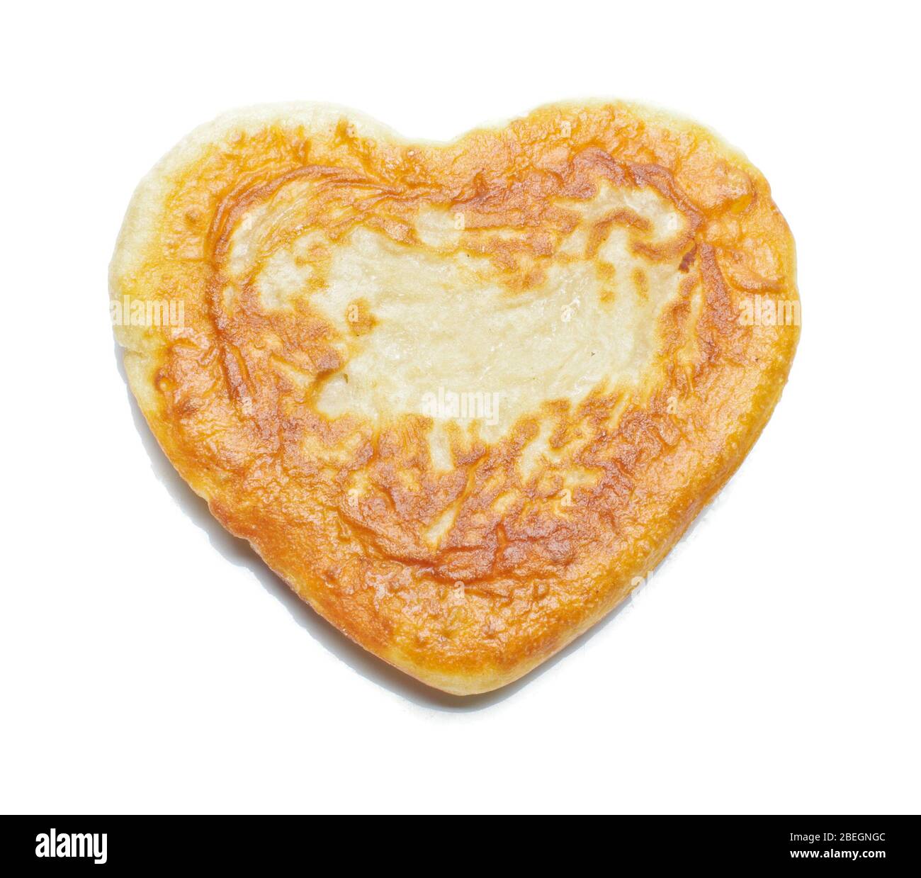 Heart shape flapjack isolated on the white background Stock Photo - Alamy