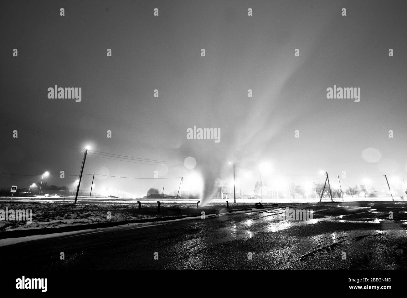 Toxic steam from well on the street. Pollution concept Stock Photo - Alamy