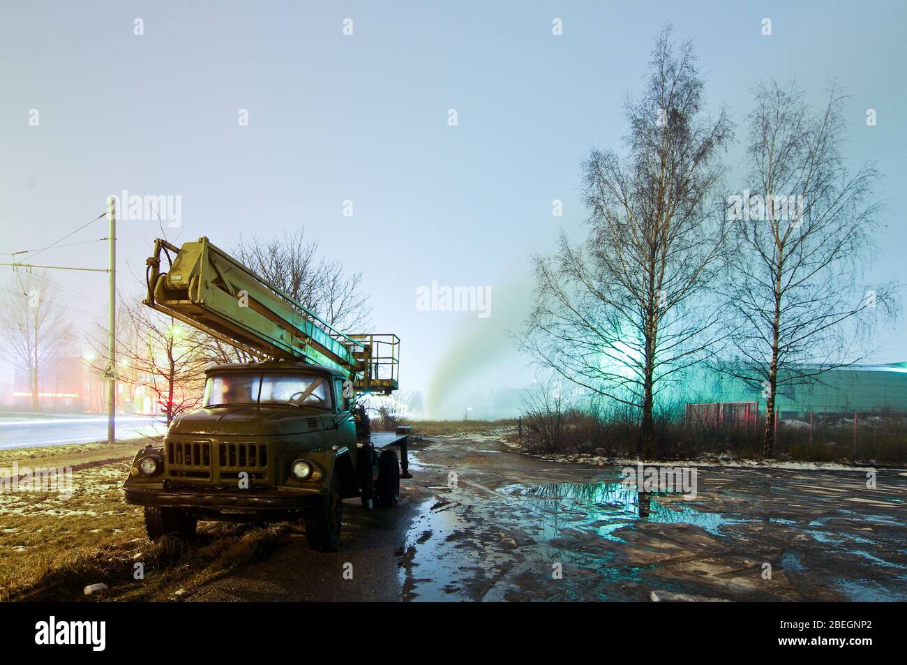 Toxic steam from well on the street. Pollution concept Stock Photo - Alamy