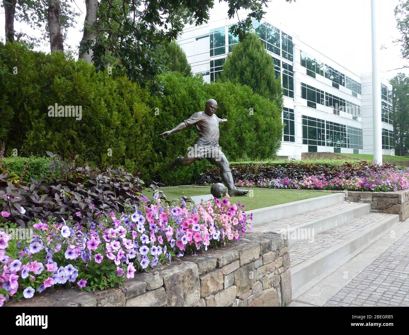 Oregon, AUG 7, 2009 - Exterior view of a bronze football player statue ...