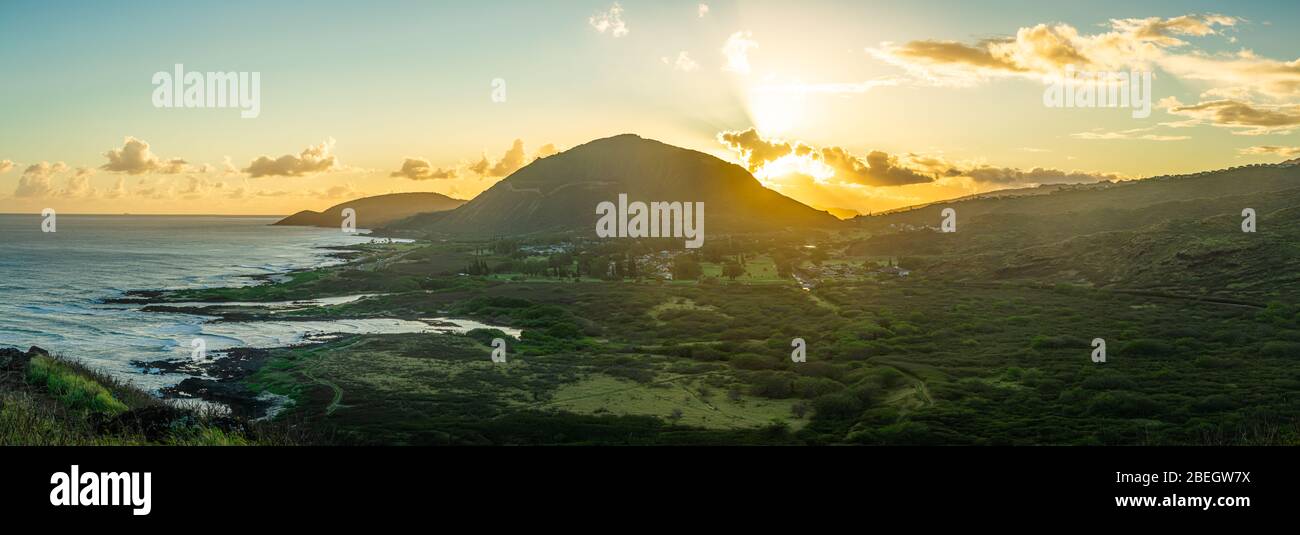 A panoramic sunset from high above the Hawaiian island of Oahu with ...