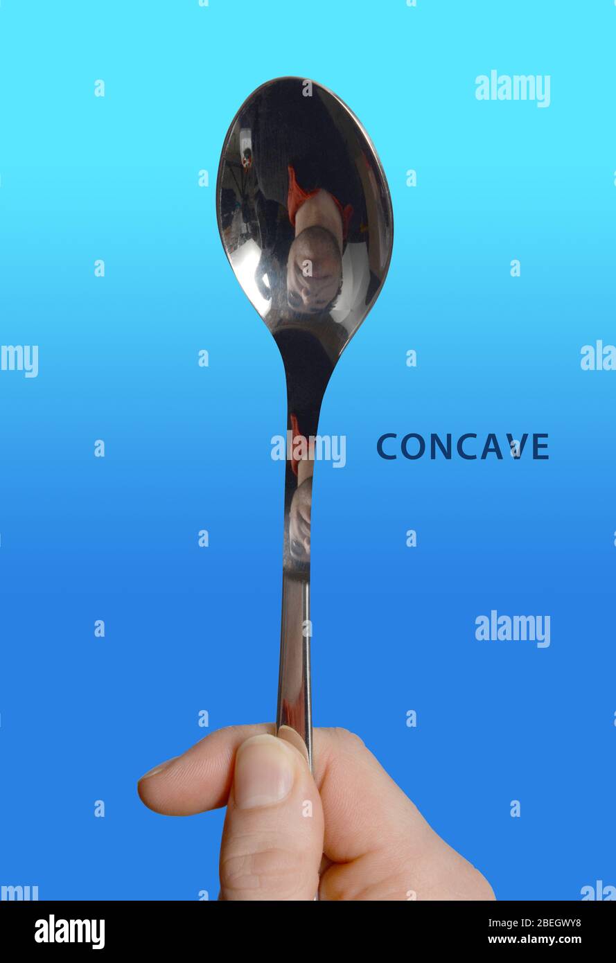 Inverted reflection spoon hi-res stock photography and images - Alamy