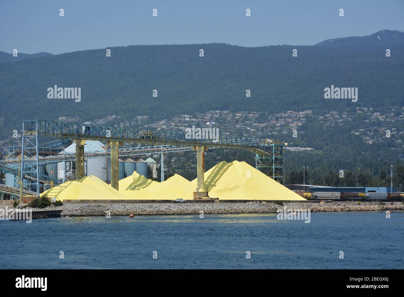 Industrial views of piles of sulphur pellets used in fertilizer seen ...