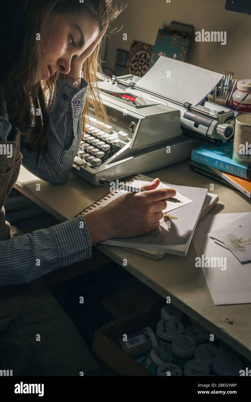 Woman in white shirt writing hi-res stock photography and images - Alamy