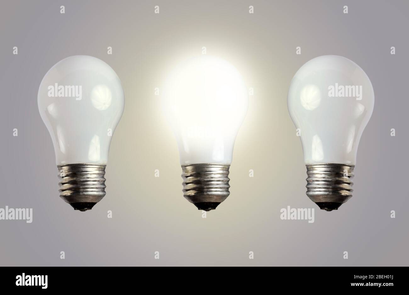 One Lit Light Bulb Stock Photo - Alamy