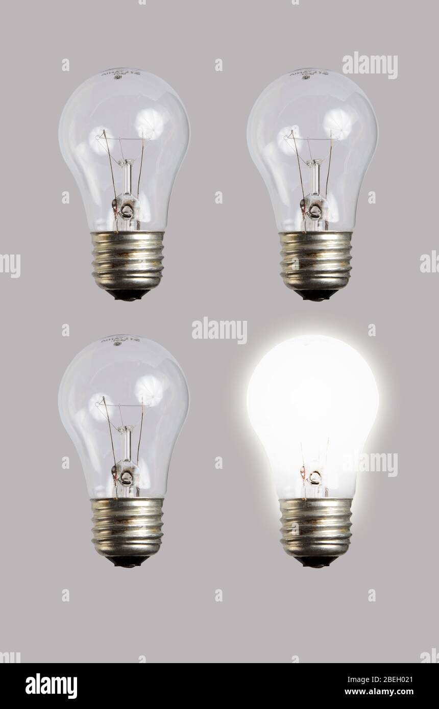 One Lit Light Bulb Stock Photo - Alamy