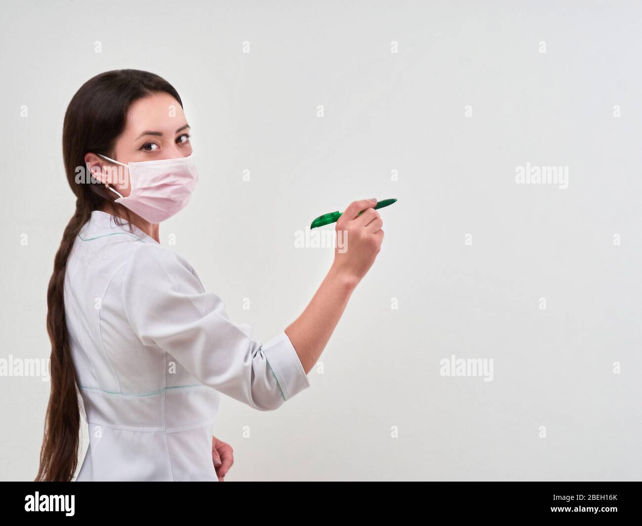 Doctor writing with marker. Doctor making notes. Medical personal with ...