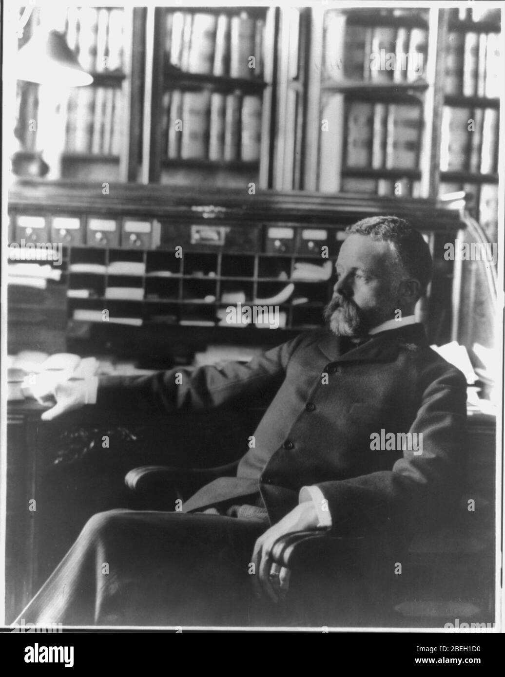 Henry Cabot Lodge, three quarter length portrait, seated at desk Stock ...