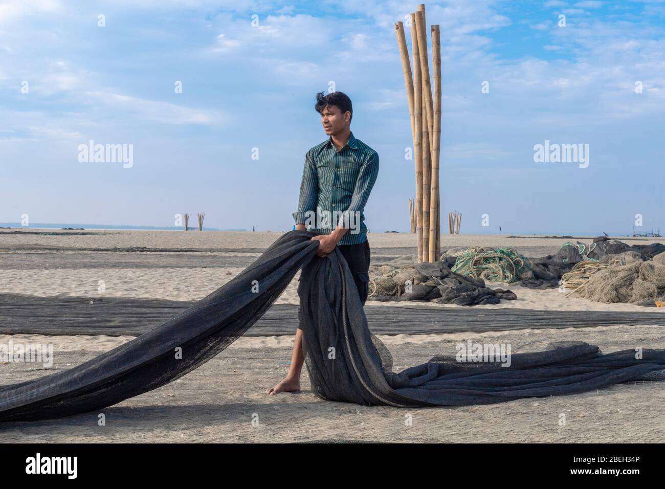 Man Holding Fishing Net in a Fishing Village North of Cox's Bazar Stock ...