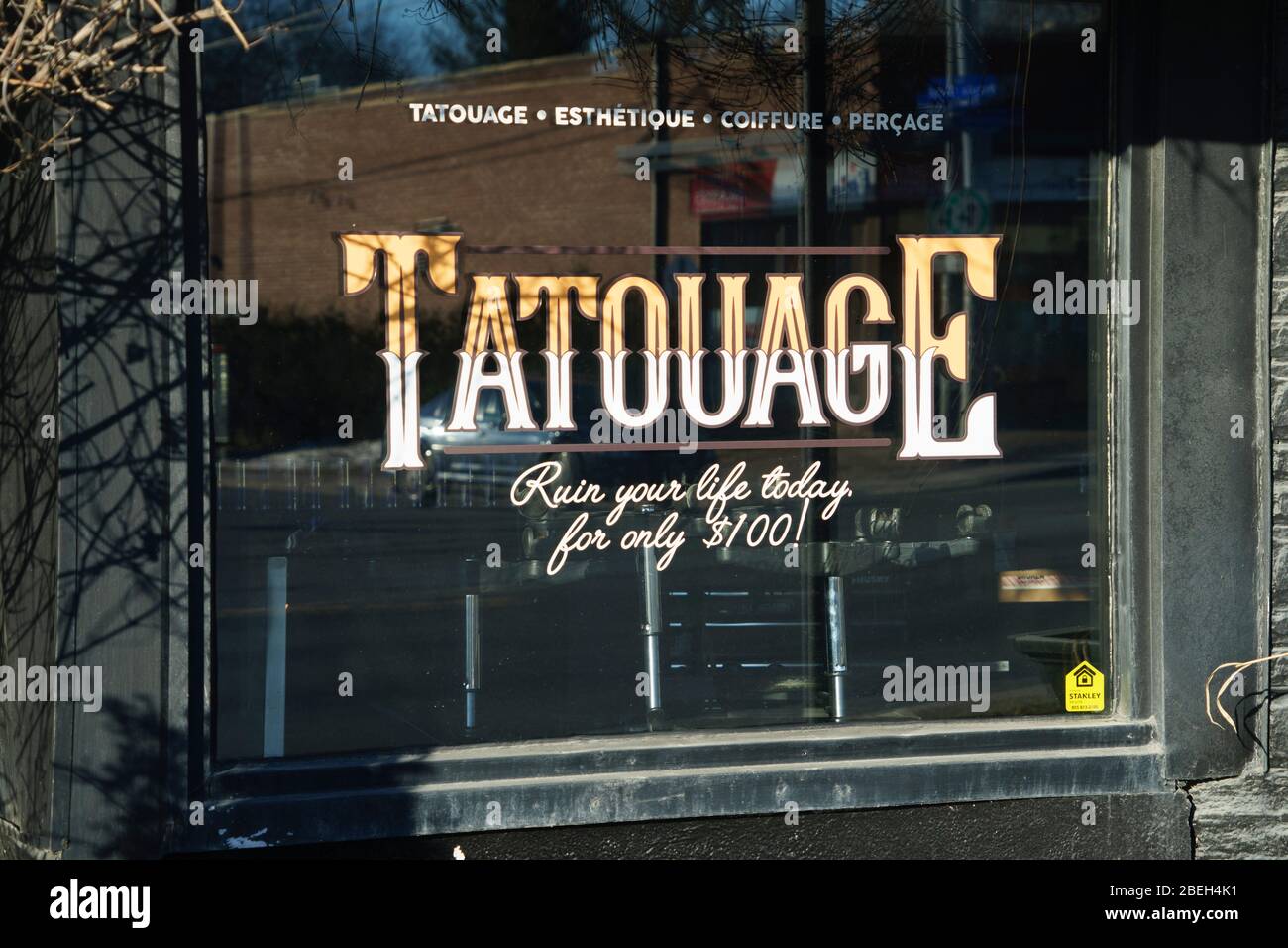 Tattoo shop window in province of Quebec, Canada Stock Photo - Alamy