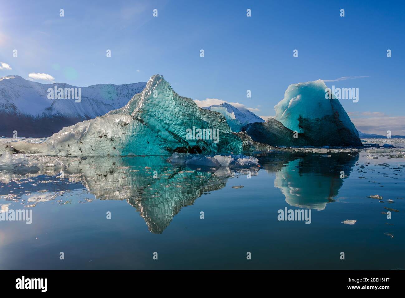 Big blue piece of ice in Arctic sea Stock Photo - Alamy