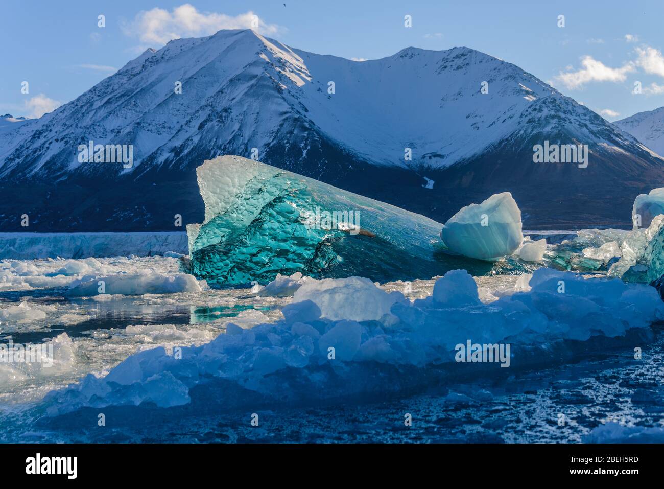 Big blue piece of ice in Arctic sea Stock Photo - Alamy