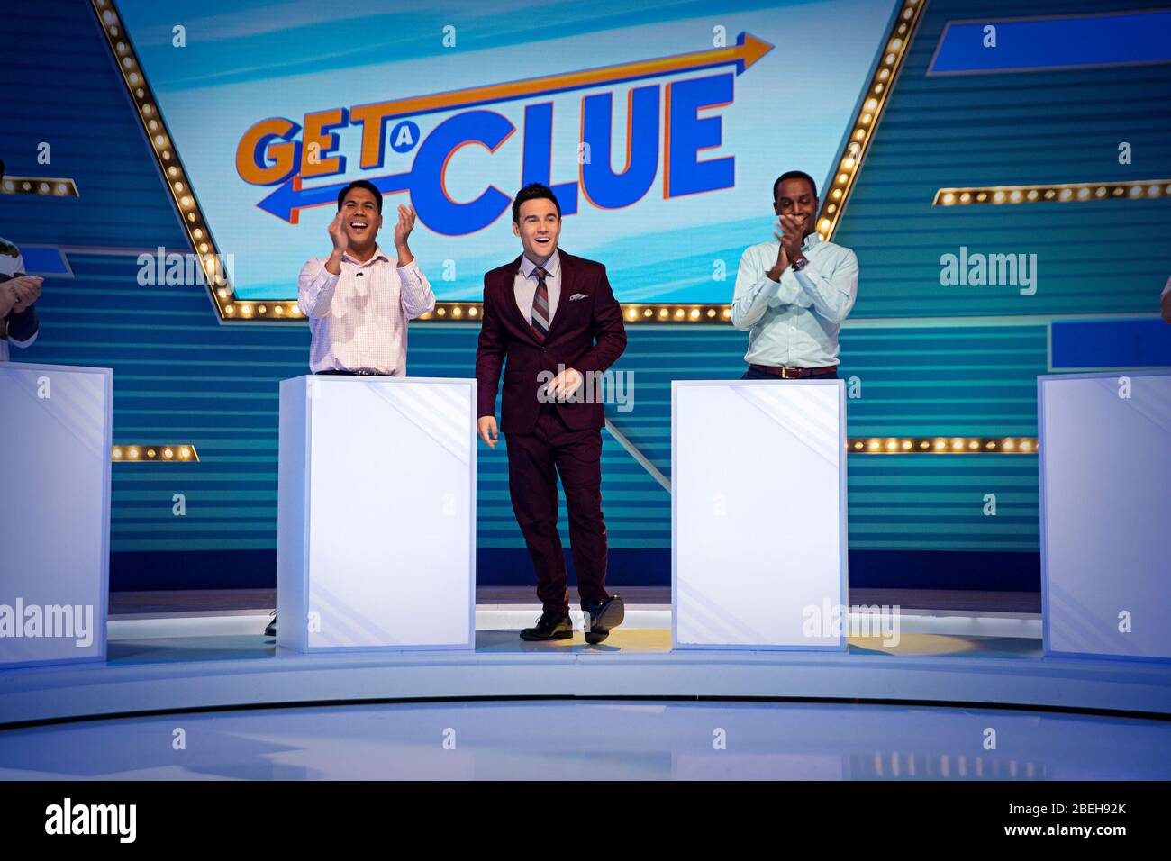 GET A CLUE, contestants with host Robert Belushi (center), (Season 1 ...