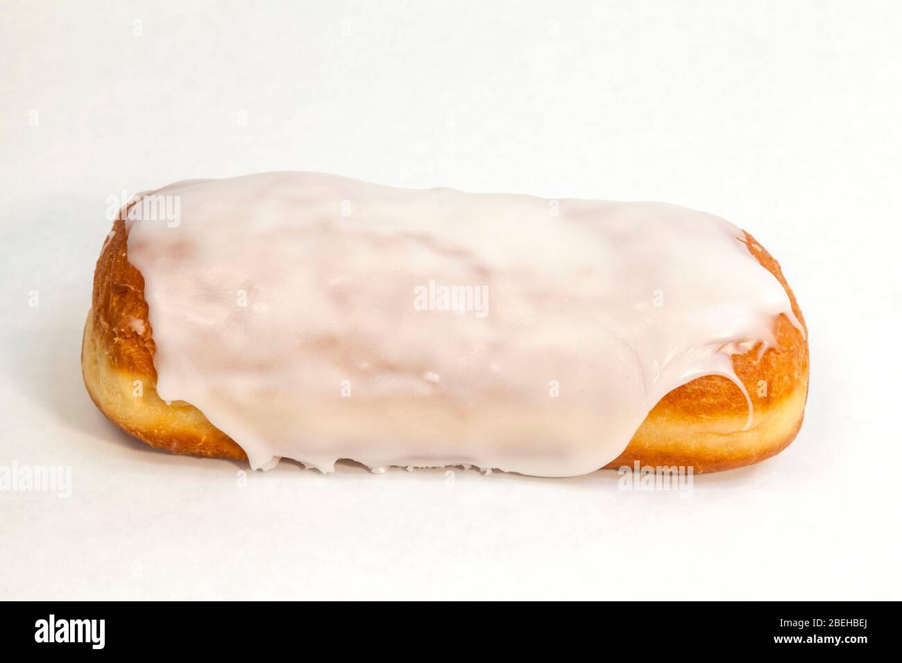 Vanilla-frosted Long John donut, by James D Coppinger/Dembinsky Photo Assoc Stock Photo - Alamy