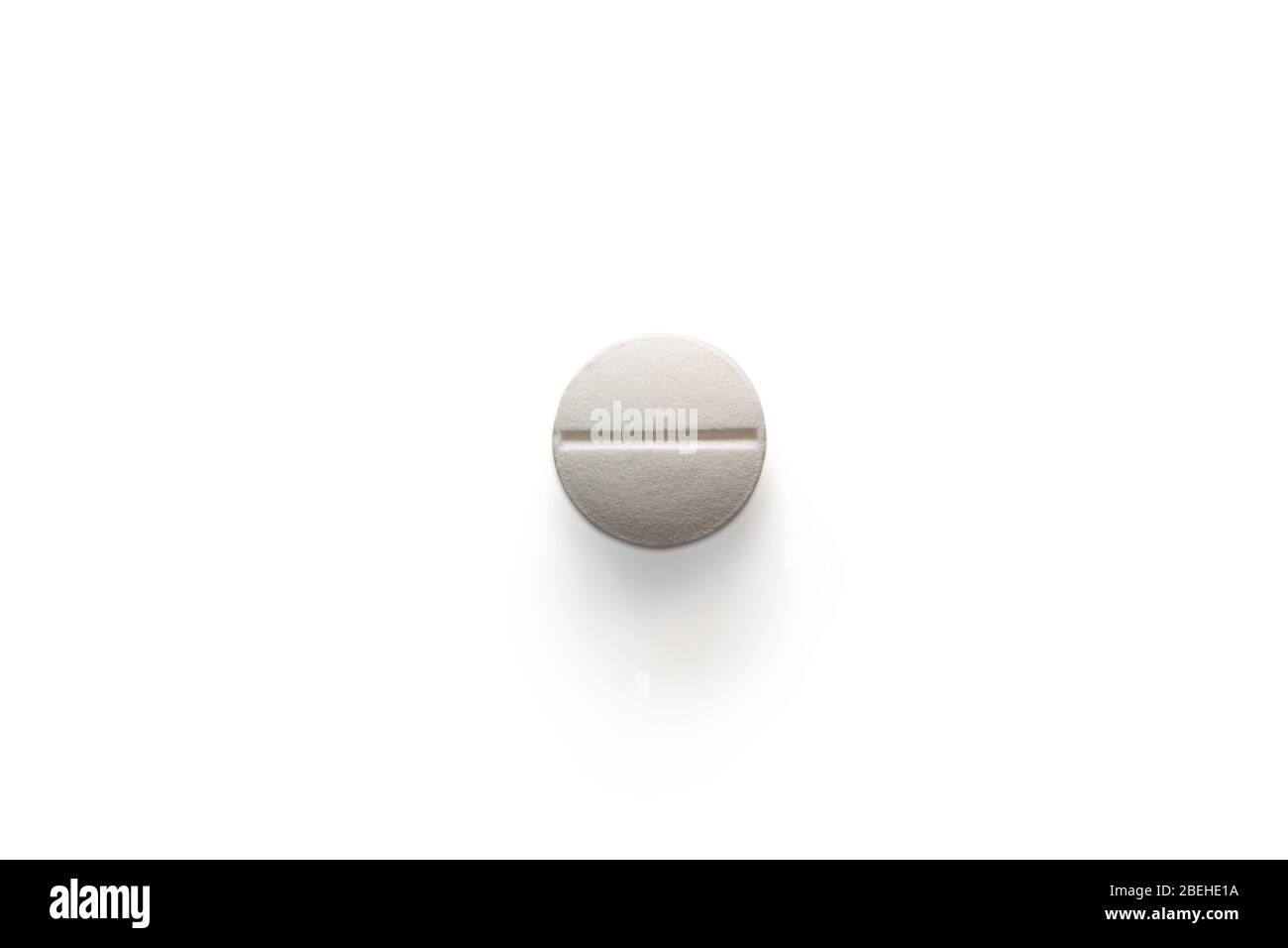 Single round white pill on white isolated background with clipping path ...
