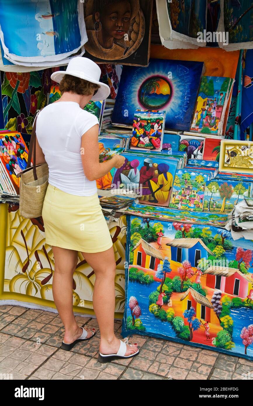 Paintings in the craft market, Marigot City, St. Martin Island, French ...