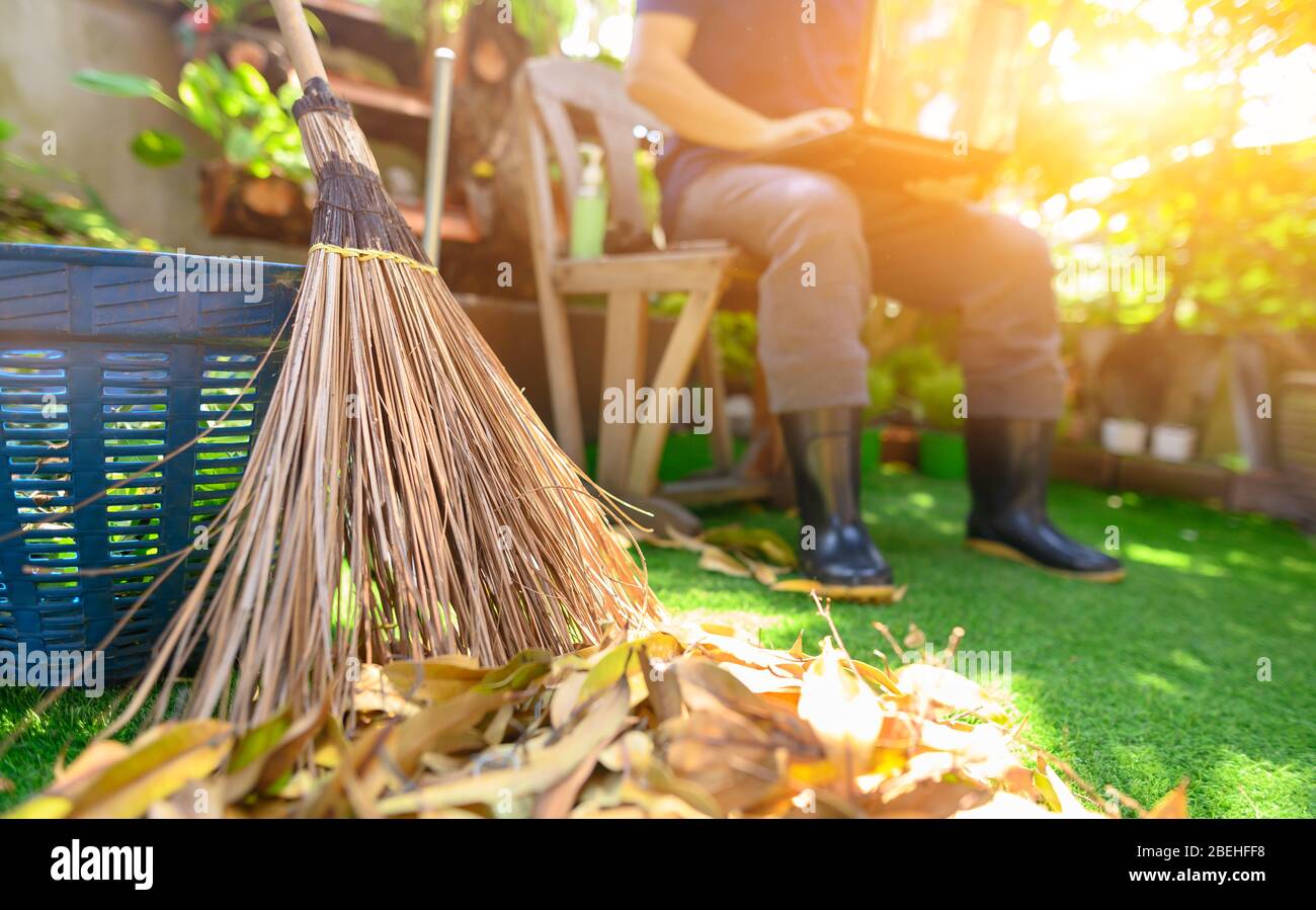 Cleaning and sweep leave at home garden. Stay home Stay safe. Effect ...