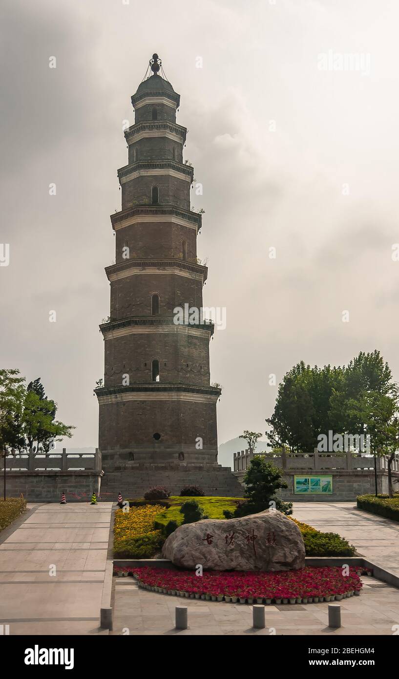 Chenjiawan, China - May 5, 2010: Local gray brick 7-level pagoda along ...