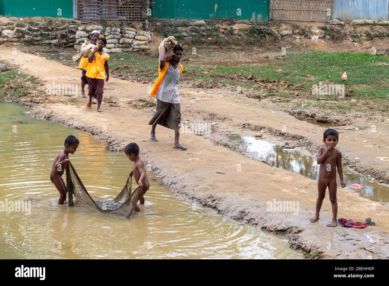 Rohingya Children Fishing With A Net in a Refugee Camp, South of Cox's ...