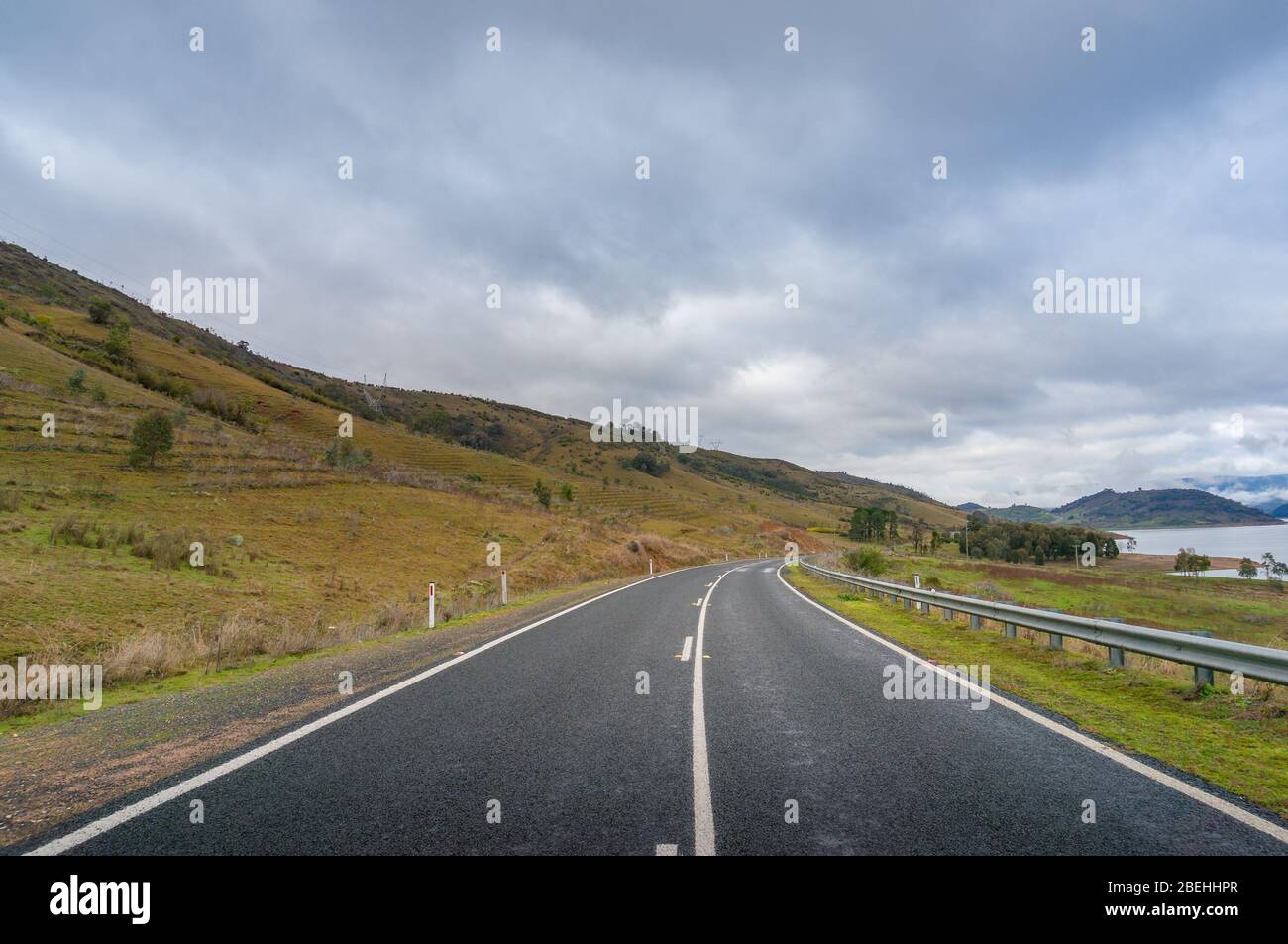 Outback asphalt road with white dividing lines and picturesque ...