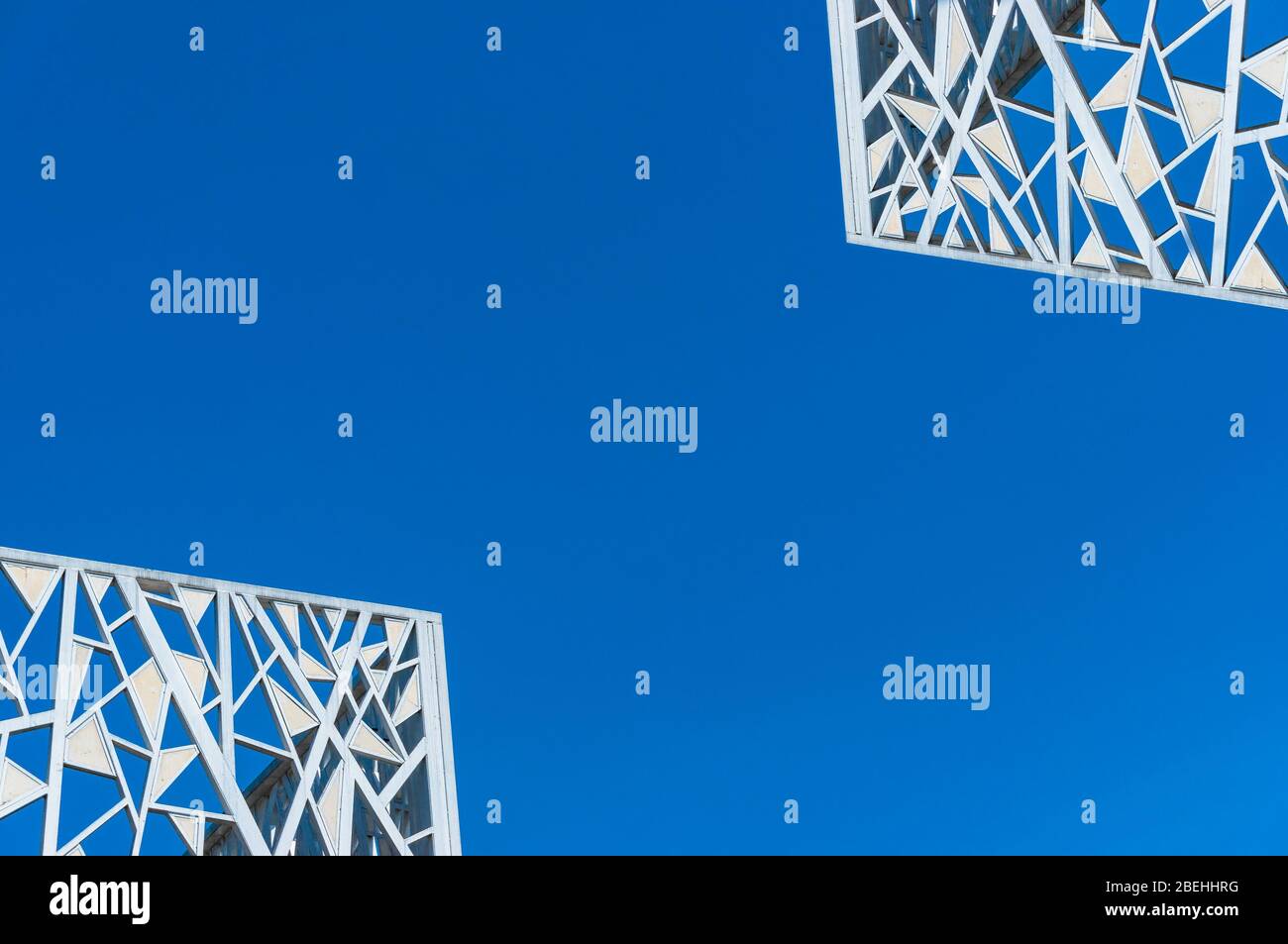 Symmetrical abstract architecture background of white frames against ...