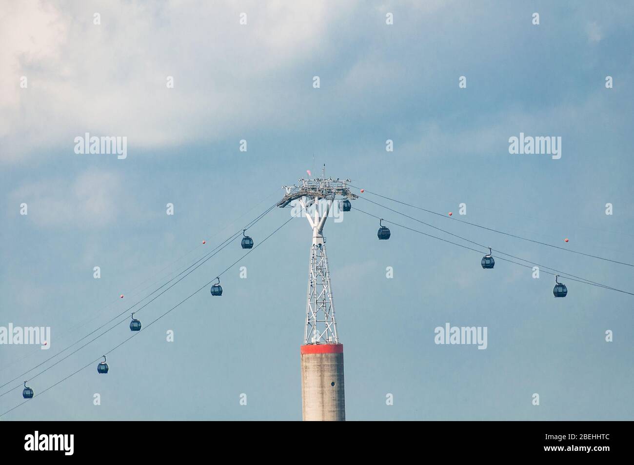 Cable car ropeway against blue sky on the background. Cable railway ...