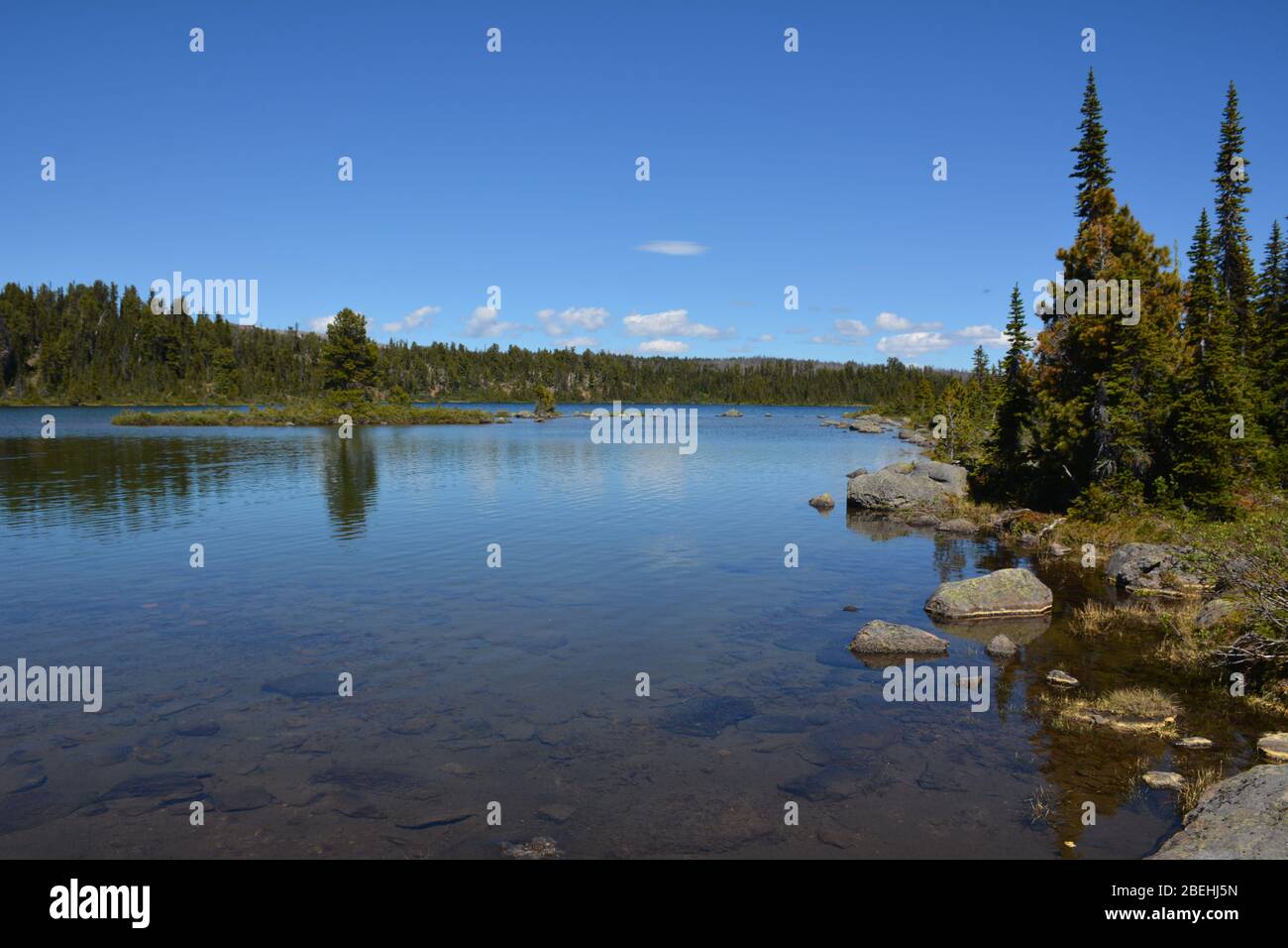 A lake on a hiking trail on the Chilcotin plateau, British Columbia ...
