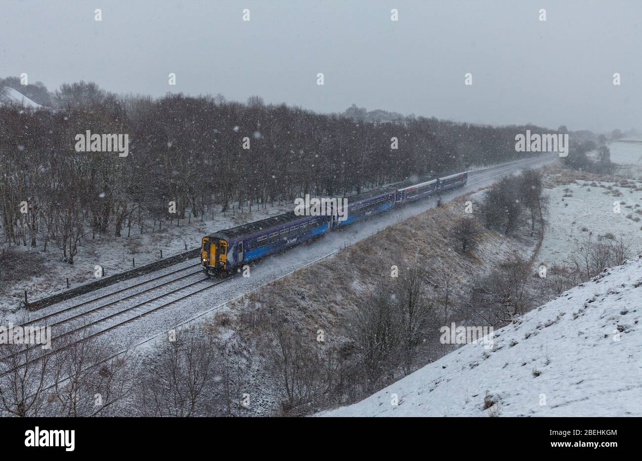 2 Scotrail class 156 sprinter trains passing Gateside on the Glasgow ...