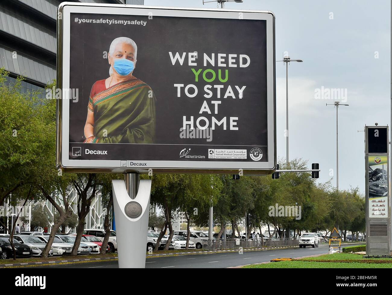 Doha, Qatar. 13th Apr, 2020. A COVID-19 awareness billboard is seen by ...