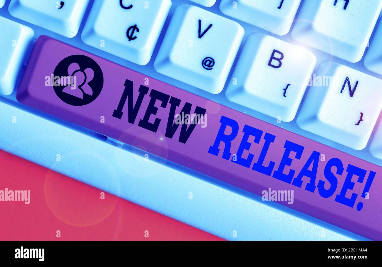Writing note showing New Release. Business concept for announcing ...