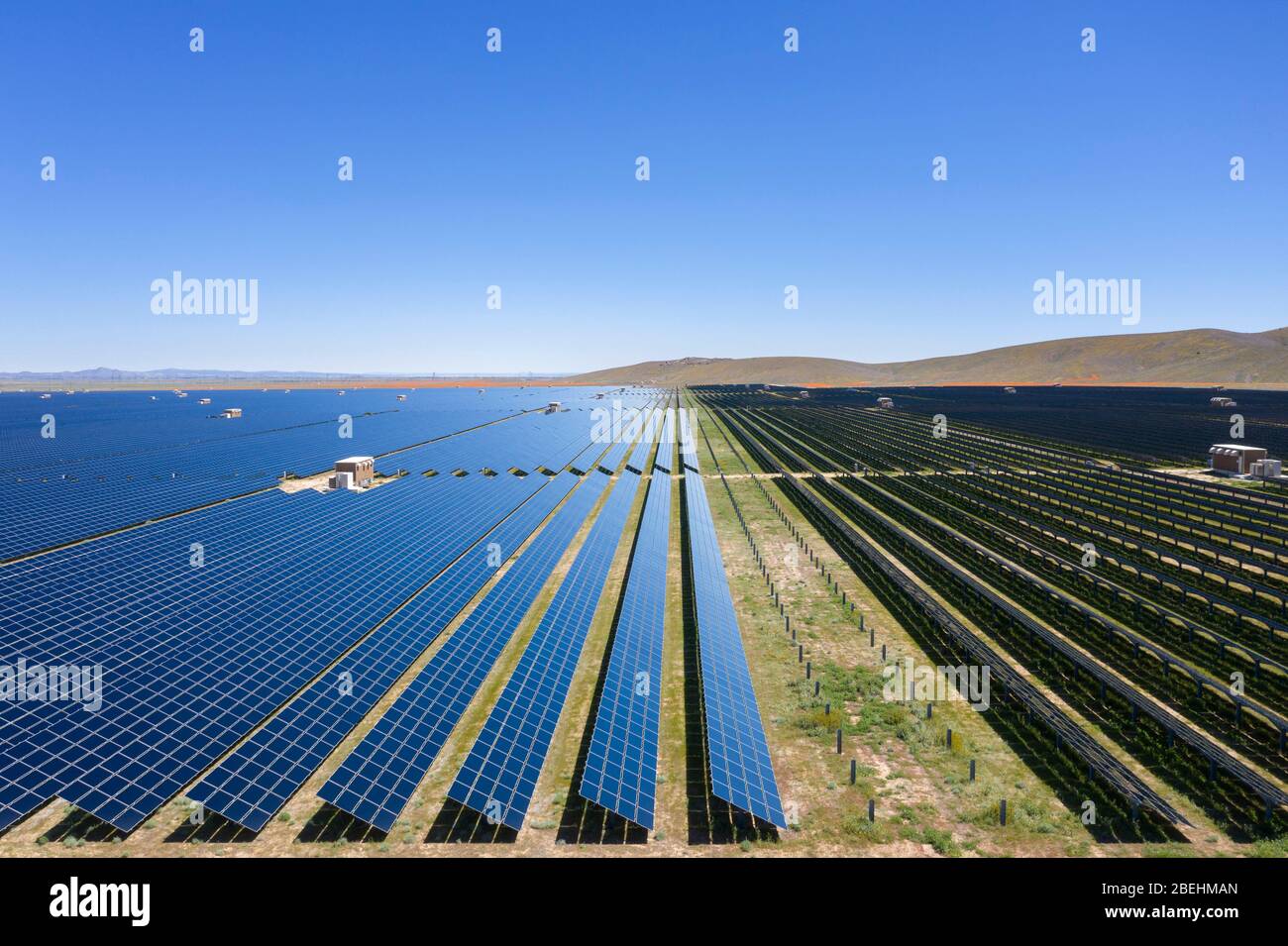Aerial view of photovoltaic (PV) green solar ranch in the Antelope ...
