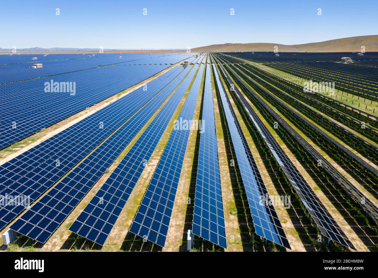Aerial view of photovoltaic (PV) green solar ranch in the Antelope ...