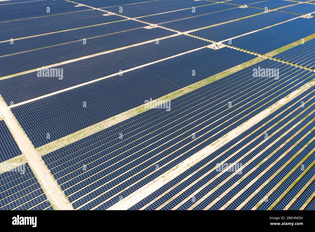 Aerial view of photovoltaic (PV) green solar ranch in the Antelope ...