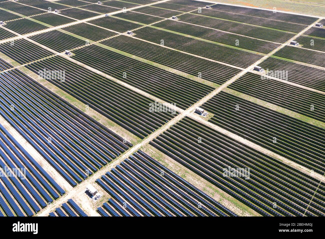 Aerial view of photovoltaic (PV) green solar ranch in the Antelope ...
