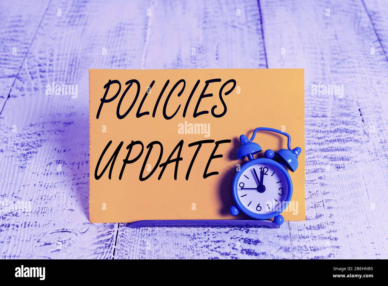 Writing note showing Policies Update. Business concept for act of ...