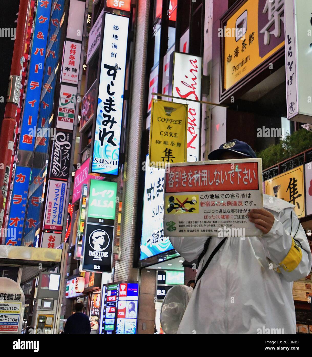 Officer of the Shinjuku ward asks for pedestrians to stay home on the ...