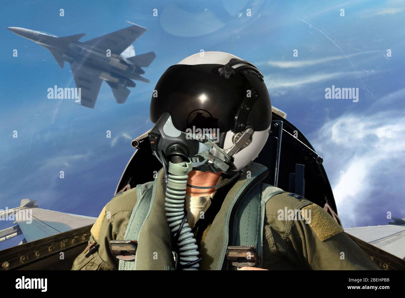 Fighter pilots cockpit view under cloudy blue sky Stock Photo - Alamy