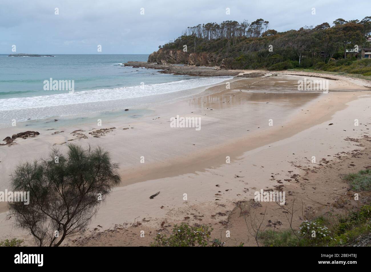 Sandy beach landscape with mild waves and no people nature background ...