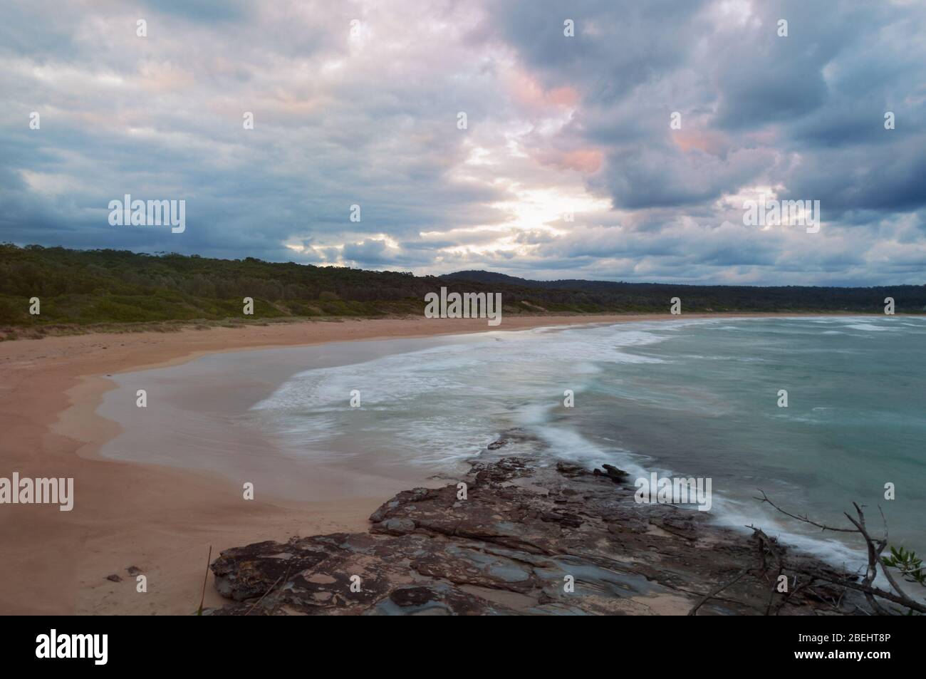 Picturesque beach sunset with sunlit clouds and empty beach. Summer ...