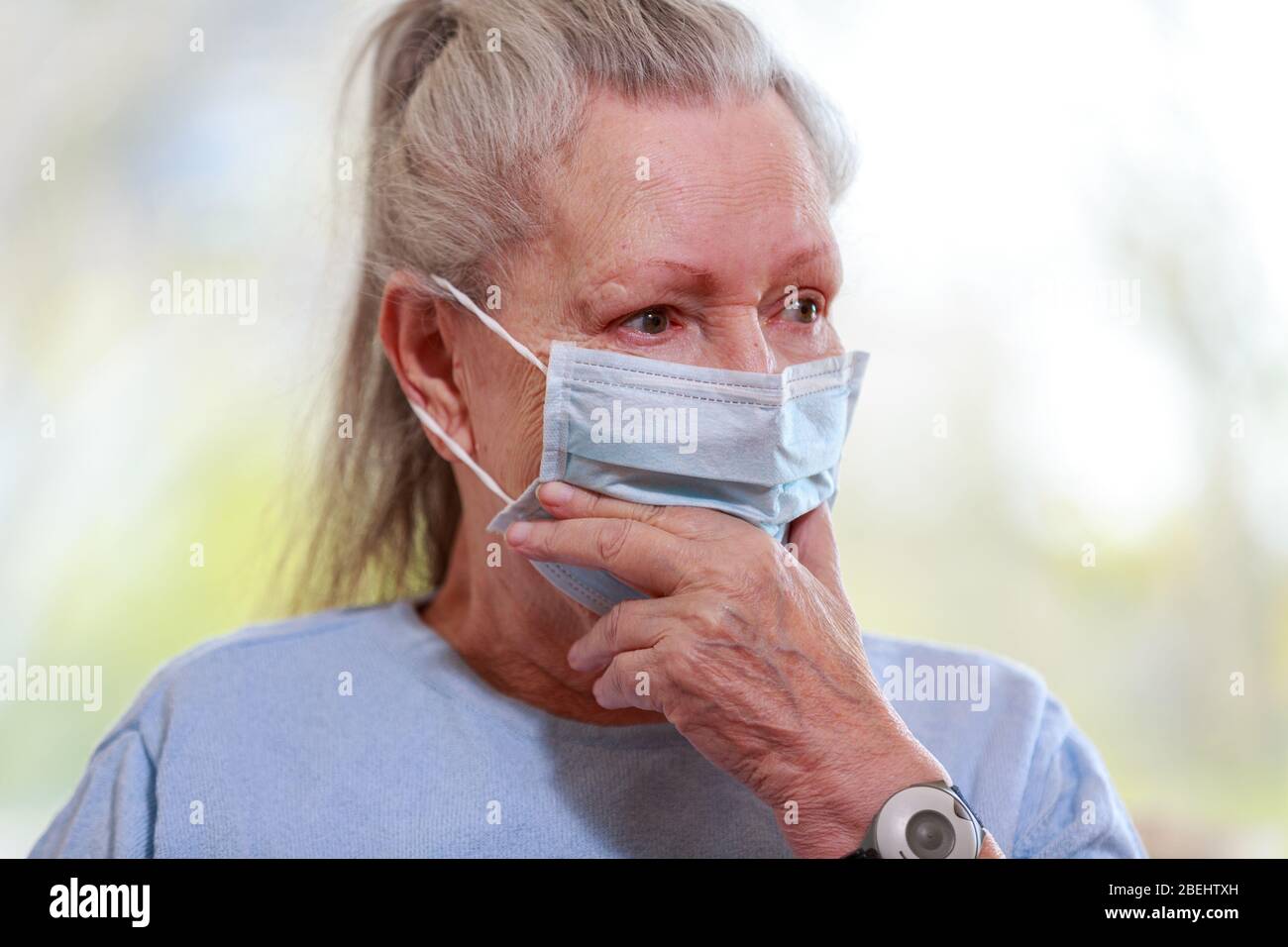 Old woman portrait with a protection mask Stock Photo - Alamy