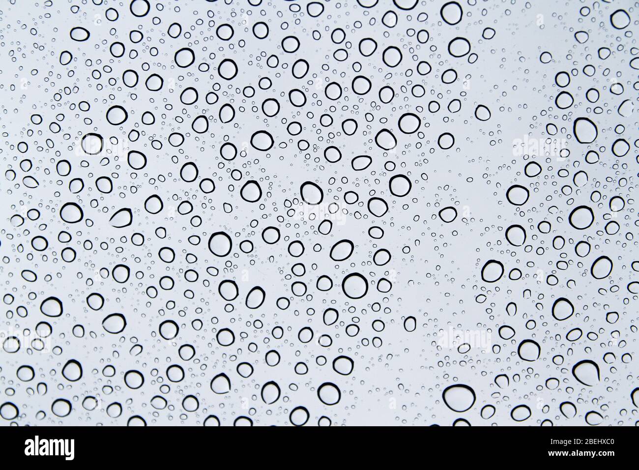 Rain droplet on glass surface Stock Photo - Alamy