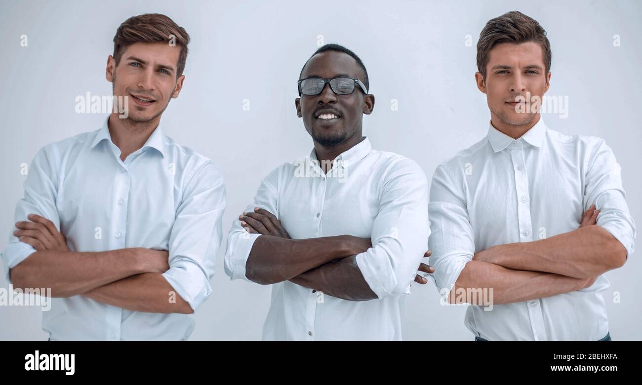 three confident business men standing together Stock Photo - Alamy
