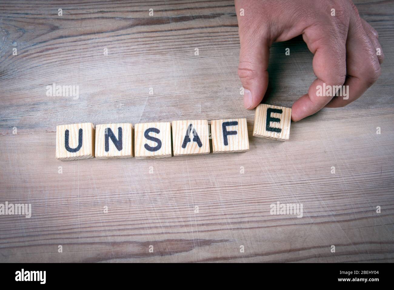 UNSAFE. Security measures, law and regulations concept. Alphabet ...
