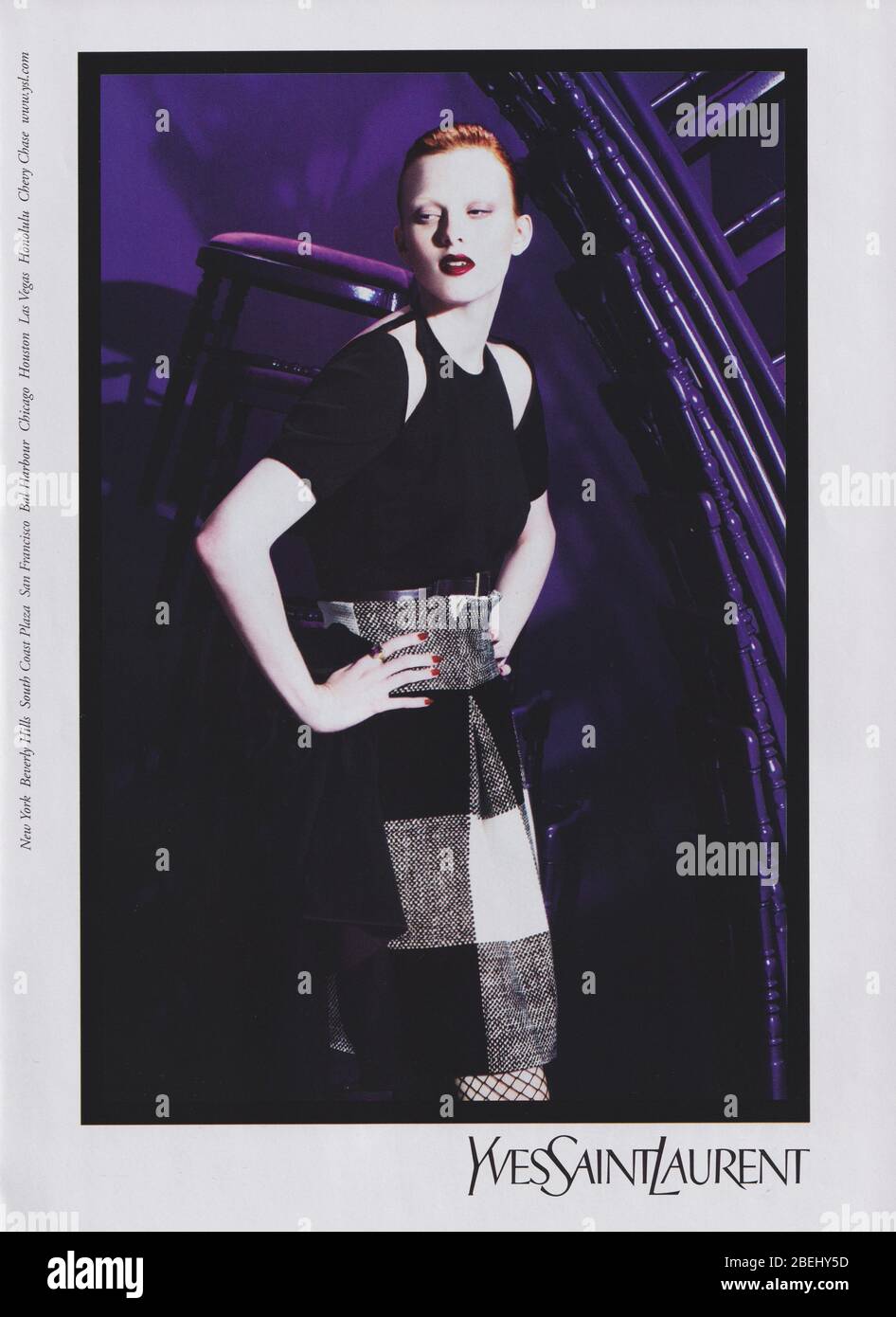 poster advertising Yves Saint Laurent fashion house in paper magazine ...