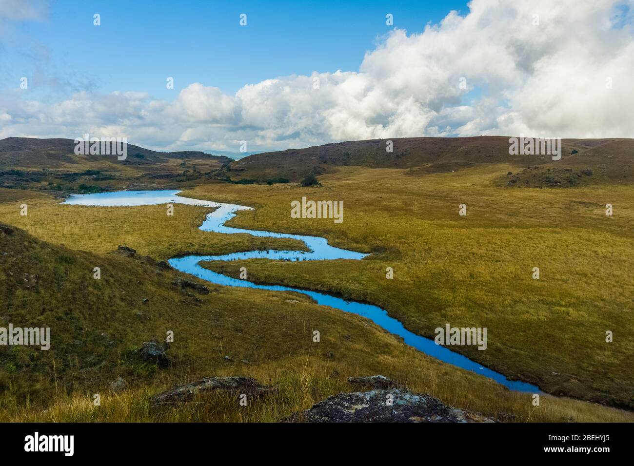 amazing landscape in the countryside with a stream flowing by and a ...