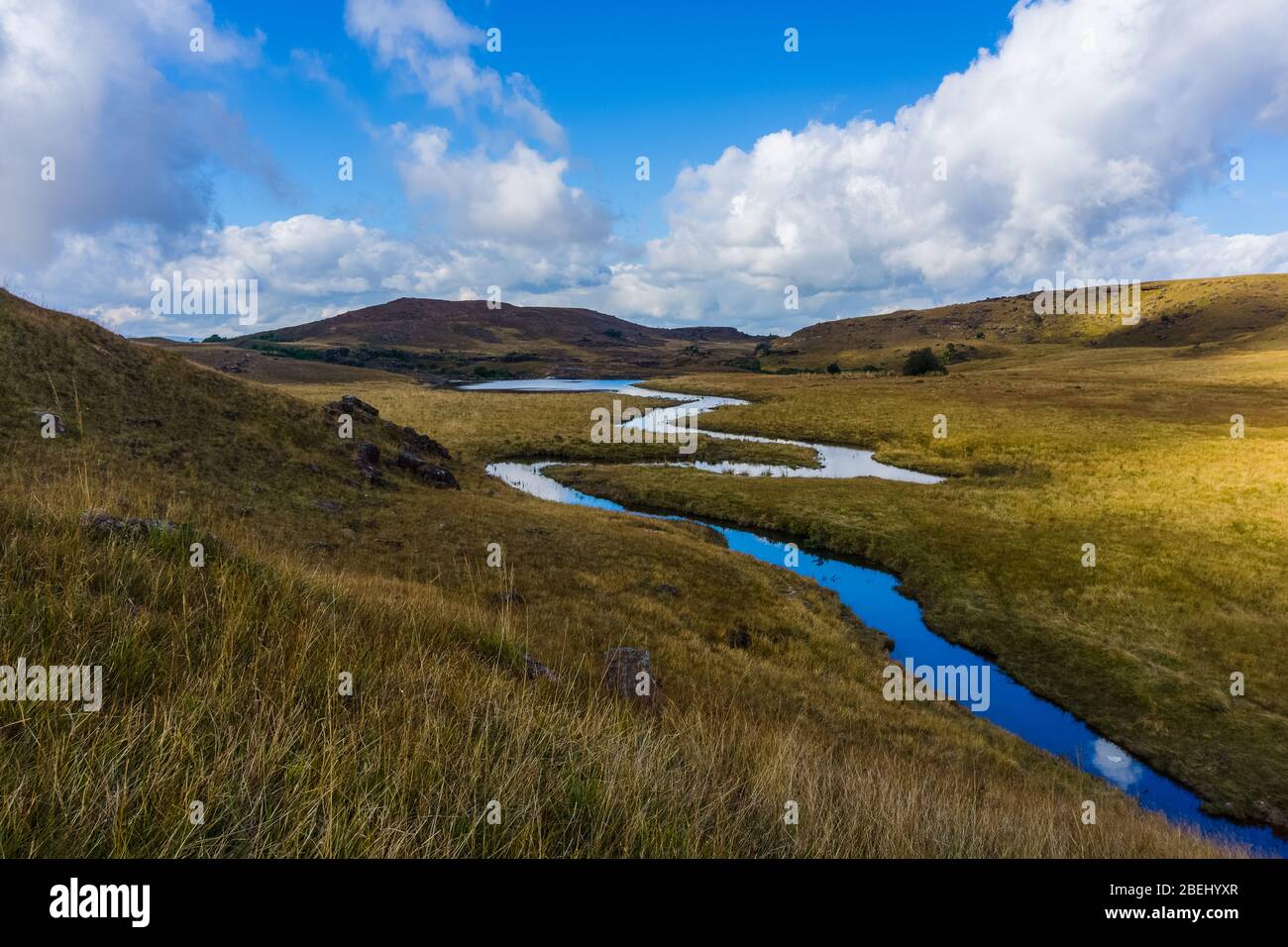 amazing landscape in the countryside with a stream flowing by and a ...