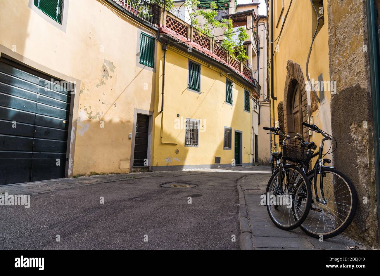 Narrow streets of Lucca ancient town with traditional architecture ...