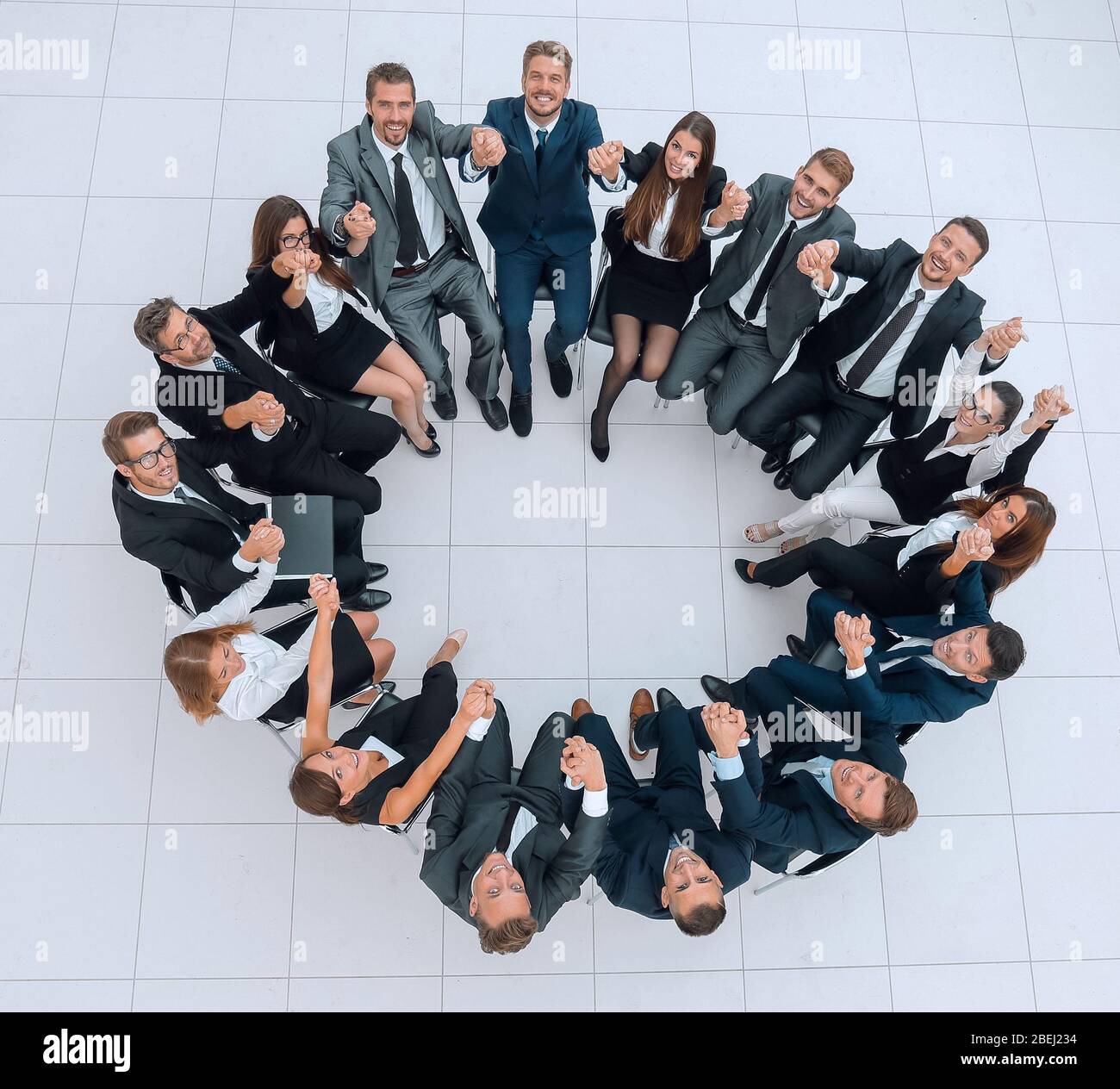 concept of team building .large successful business team sitting in a ...