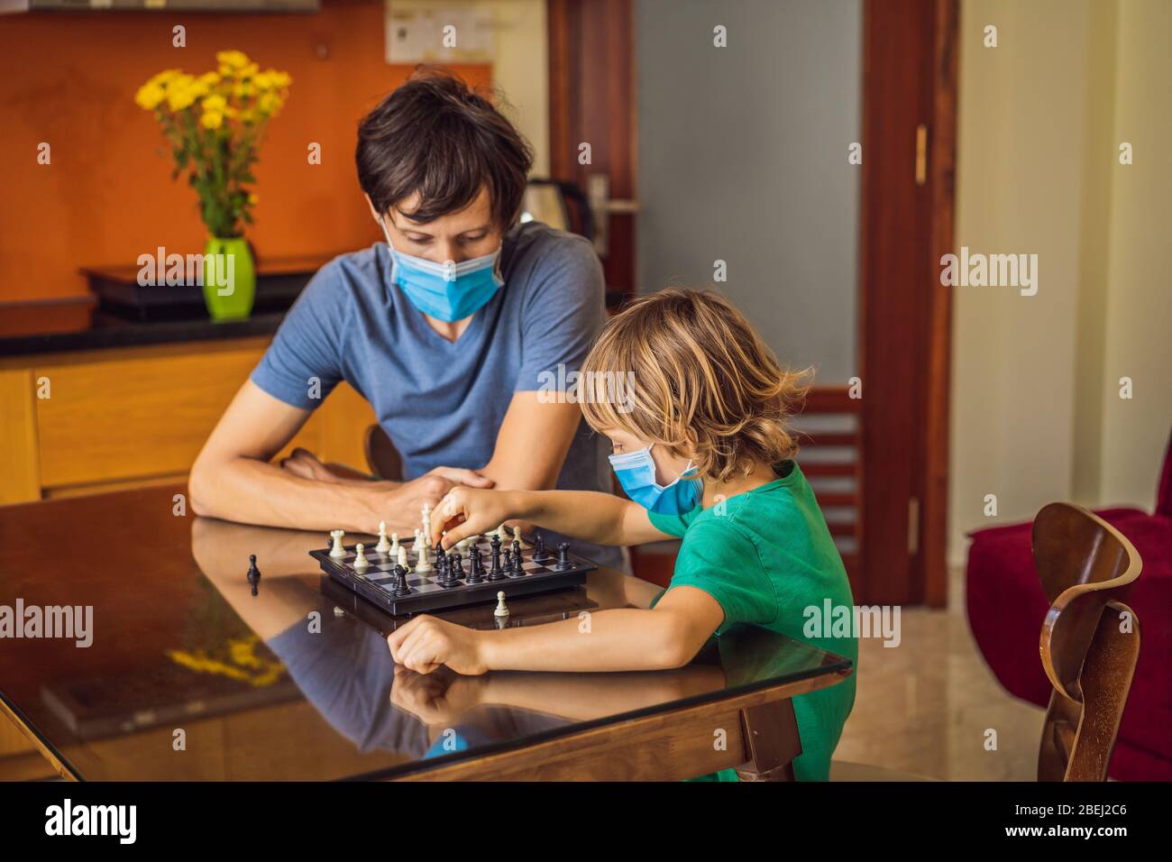 Happy Family Playing Board Game At Home. Stay at home due to quarantine ...