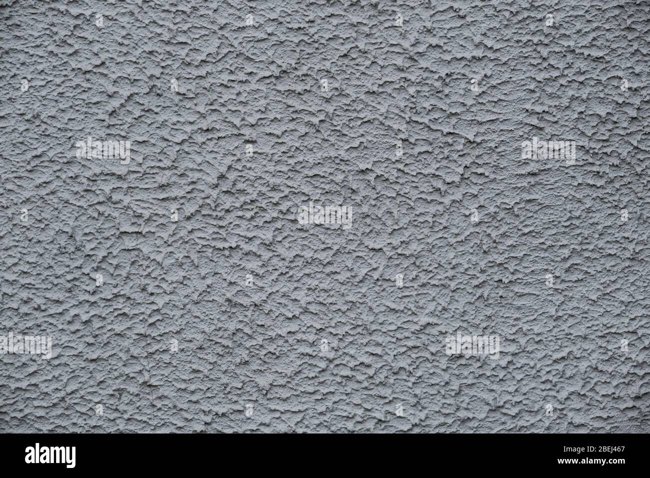 Concrete background with a dirty texture in the form of drips and drops ...